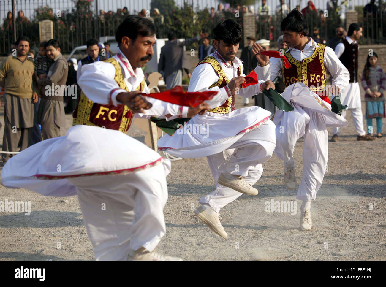 Artists are performing folk dance during to entertain visitors of three ...