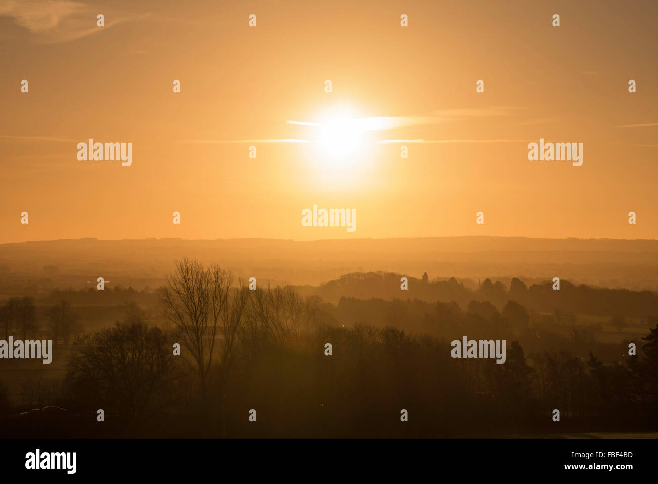 Sun Rising over the Countryside Stock Photo - Alamy
