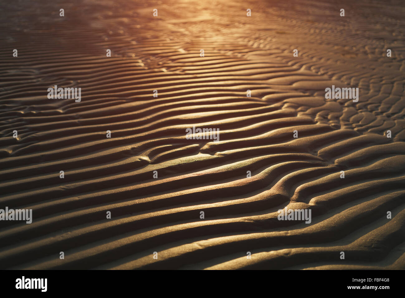Beach sand waves warm texture hi-res stock photography and images - Alamy