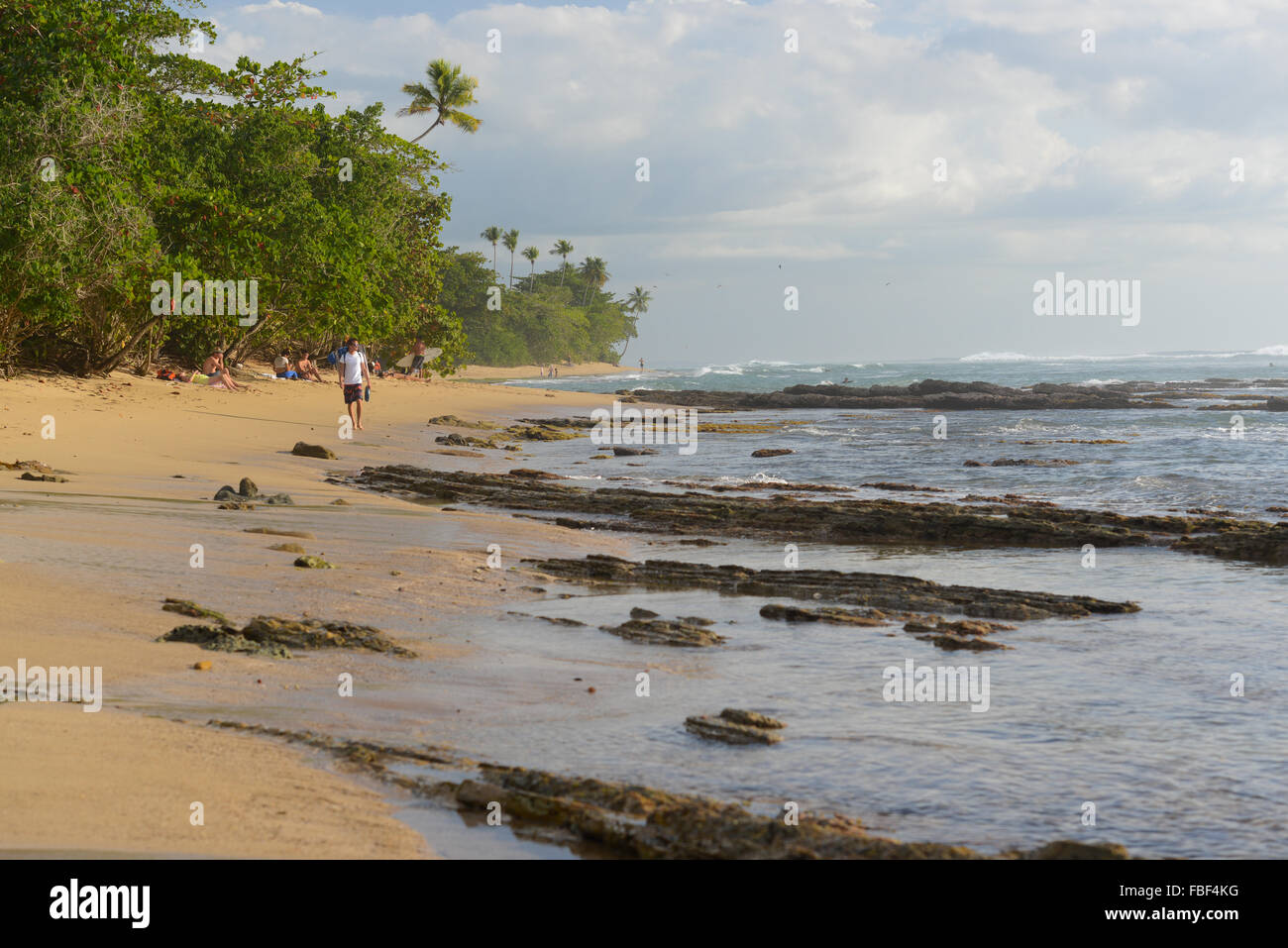 Sand, surfers and tourists at Maria's Beach. Rincon, Puerto Rico. USA ...