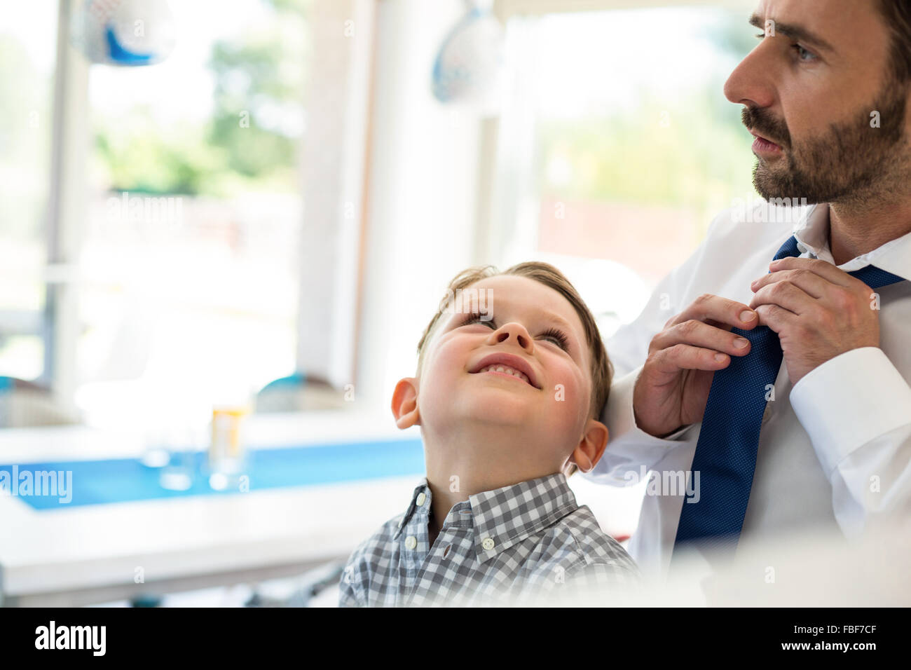 Father and son getting ready Stock Photo - Alamy
