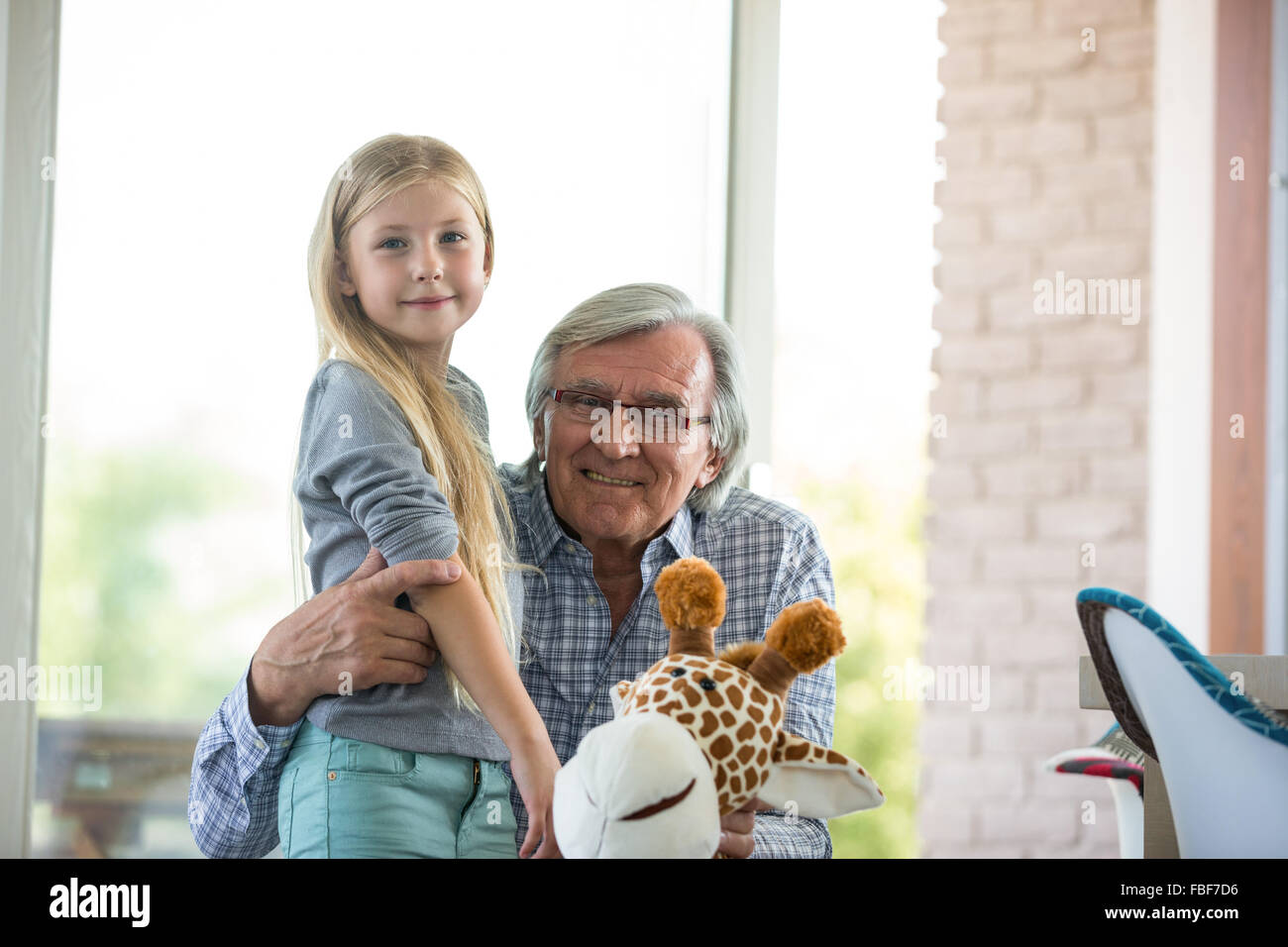 Granddaughter girl hugging hi-res stock photography and images - Alamy