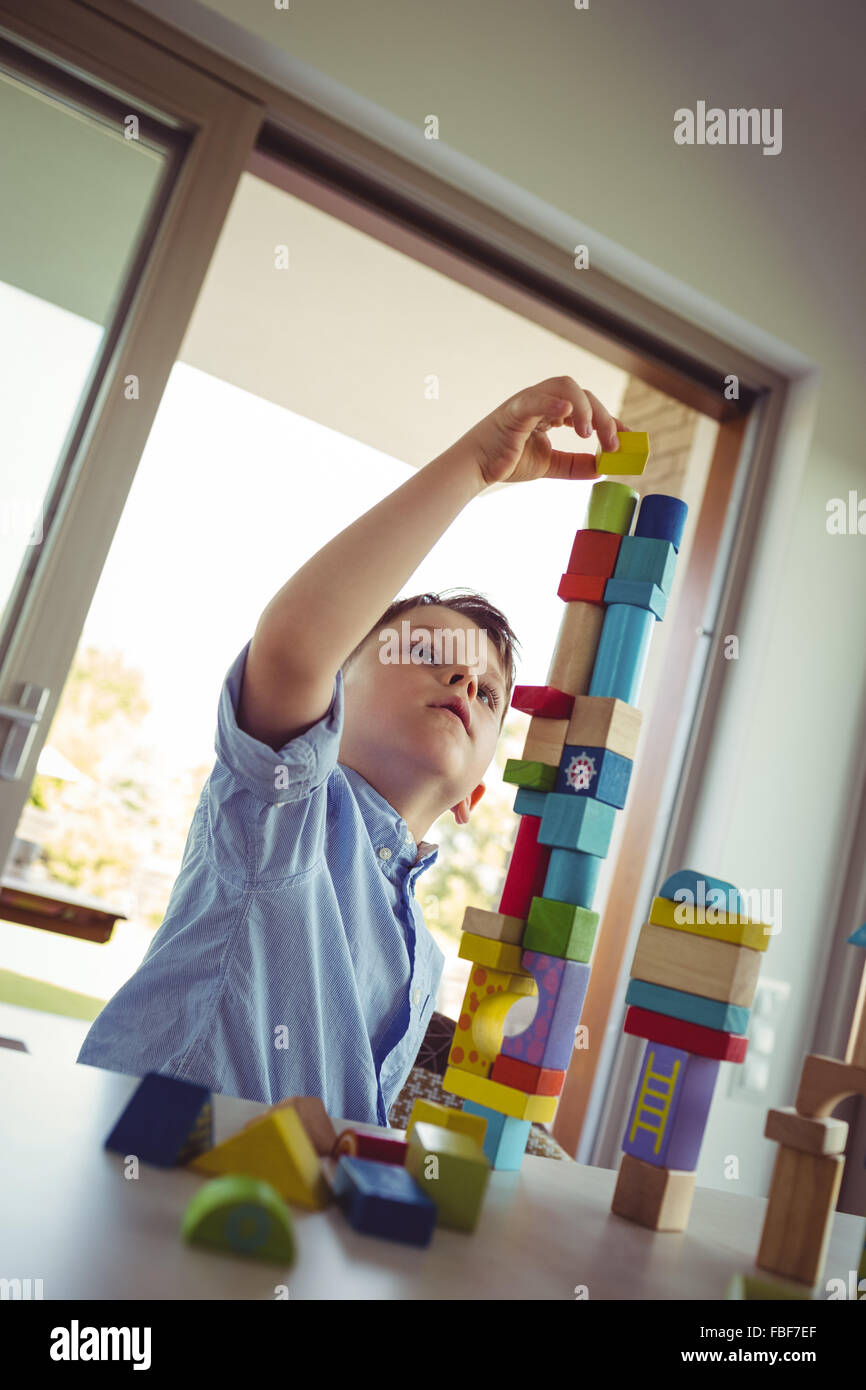 Boy playing with blocks hi-res stock photography and images - Alamy