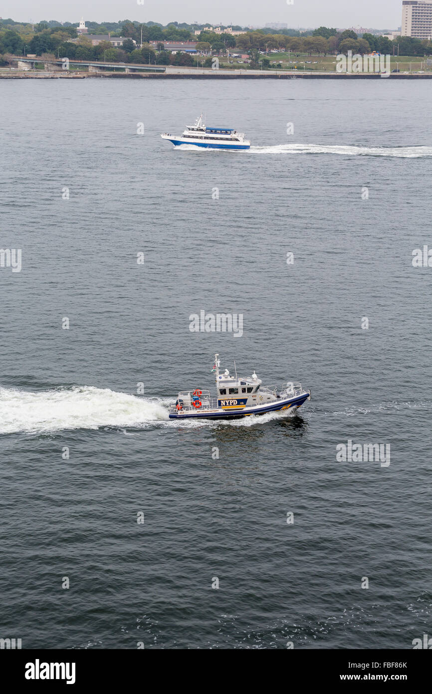 NYPD Police Boat and Ferry in New York Harbor Stock Photo - Alamy