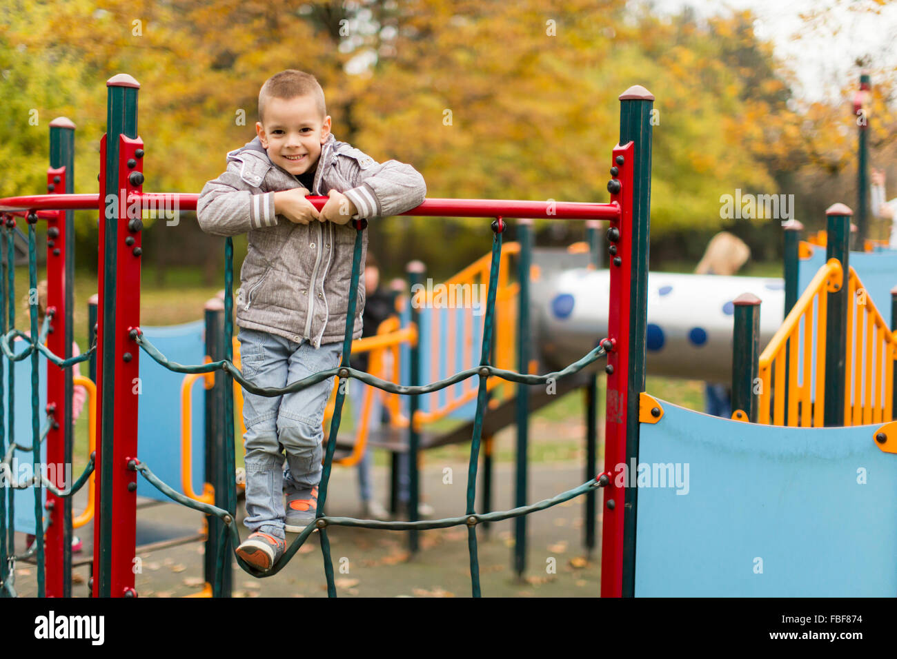 Little boy at playground Stock Photo - Alamy