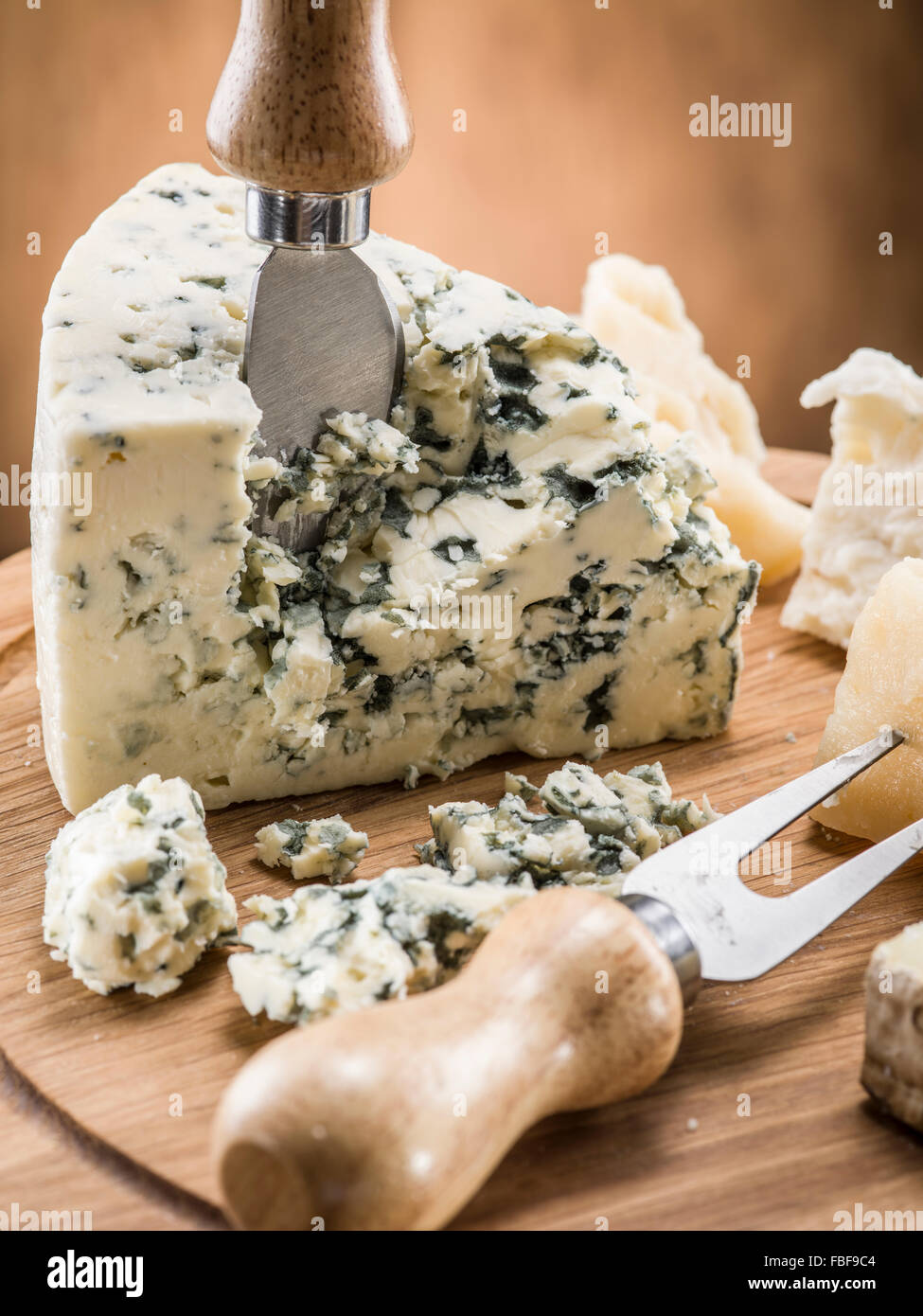 Danish blue cheese on a wooden board Stock Photo - Alamy