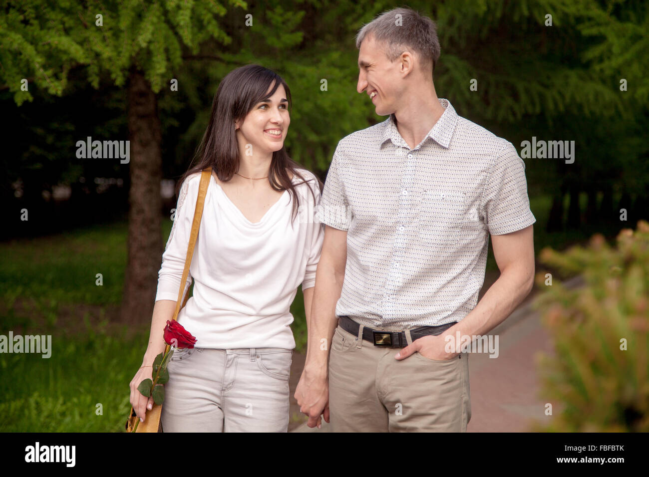 Lovers walking hand in hand hi-res stock photography and images - Alamy