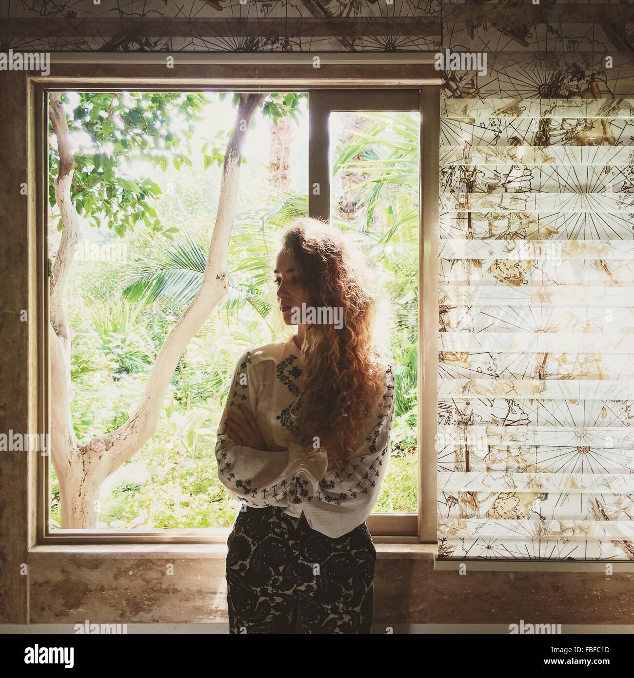 Woman standing hi-res stock photography and images - Alamy