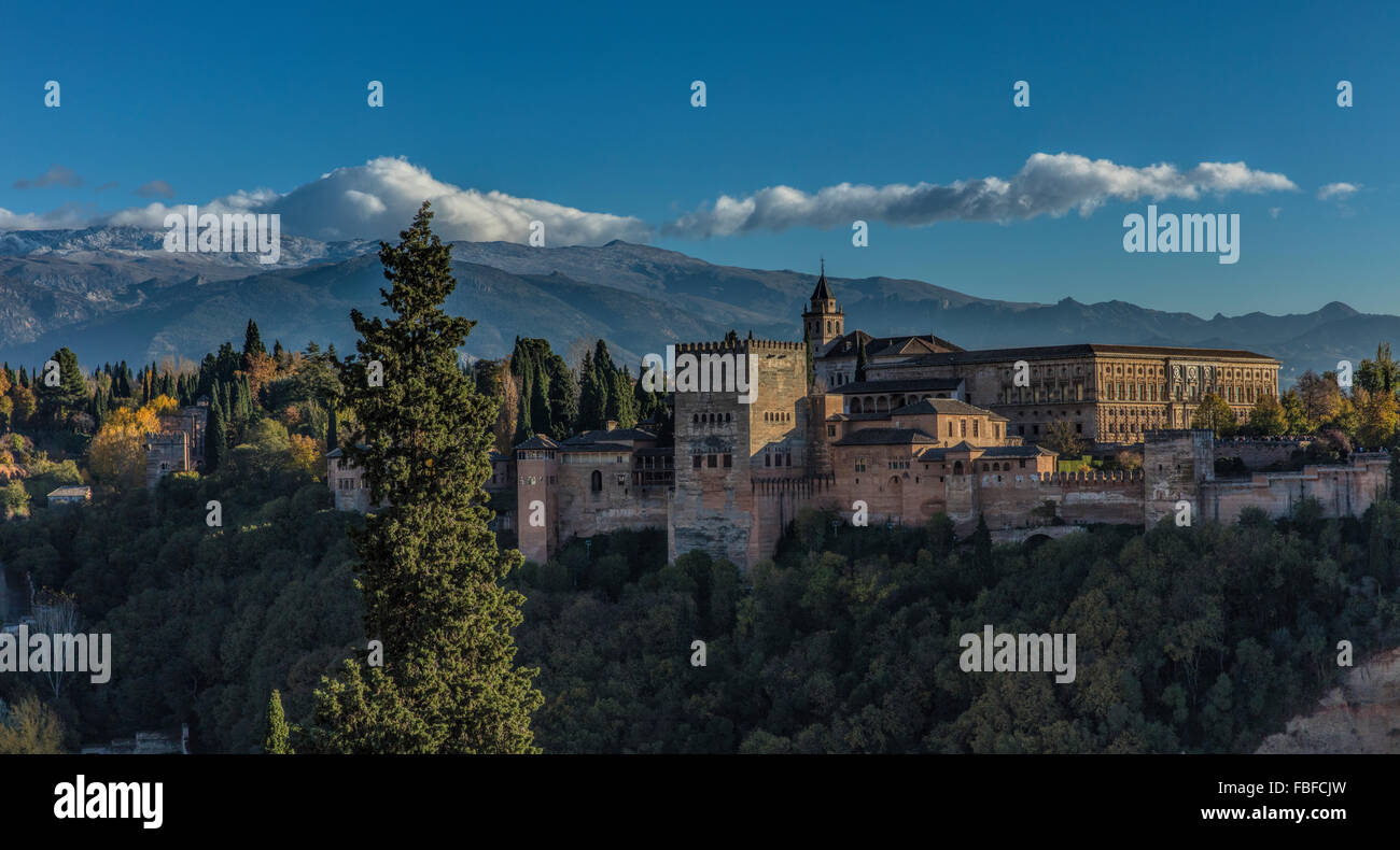 The Alhambra Palace monument in Granada Spain with the Sierra Nevada in ...