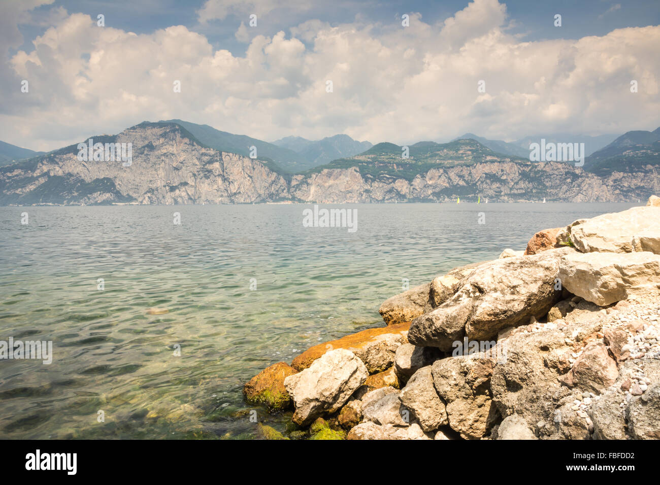 Landscape with mountains and water at Lake Garda, Italy Stock Photo - Alamy