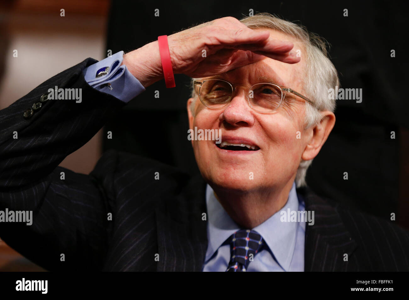 Senate Minority Leader Harry Reid of Nevada looks up into the balcony ...