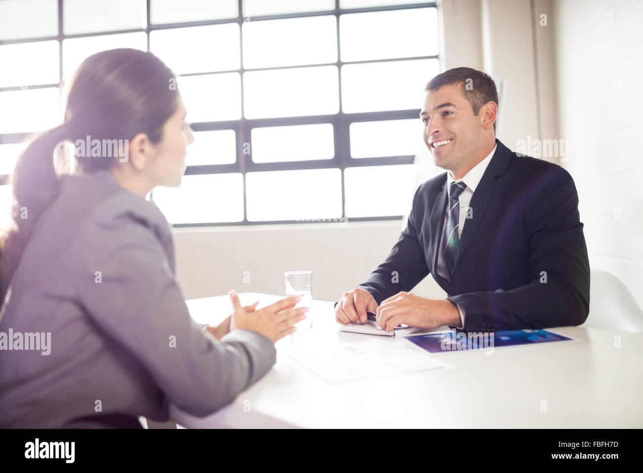 Business people having a conversation Stock Photo - Alamy