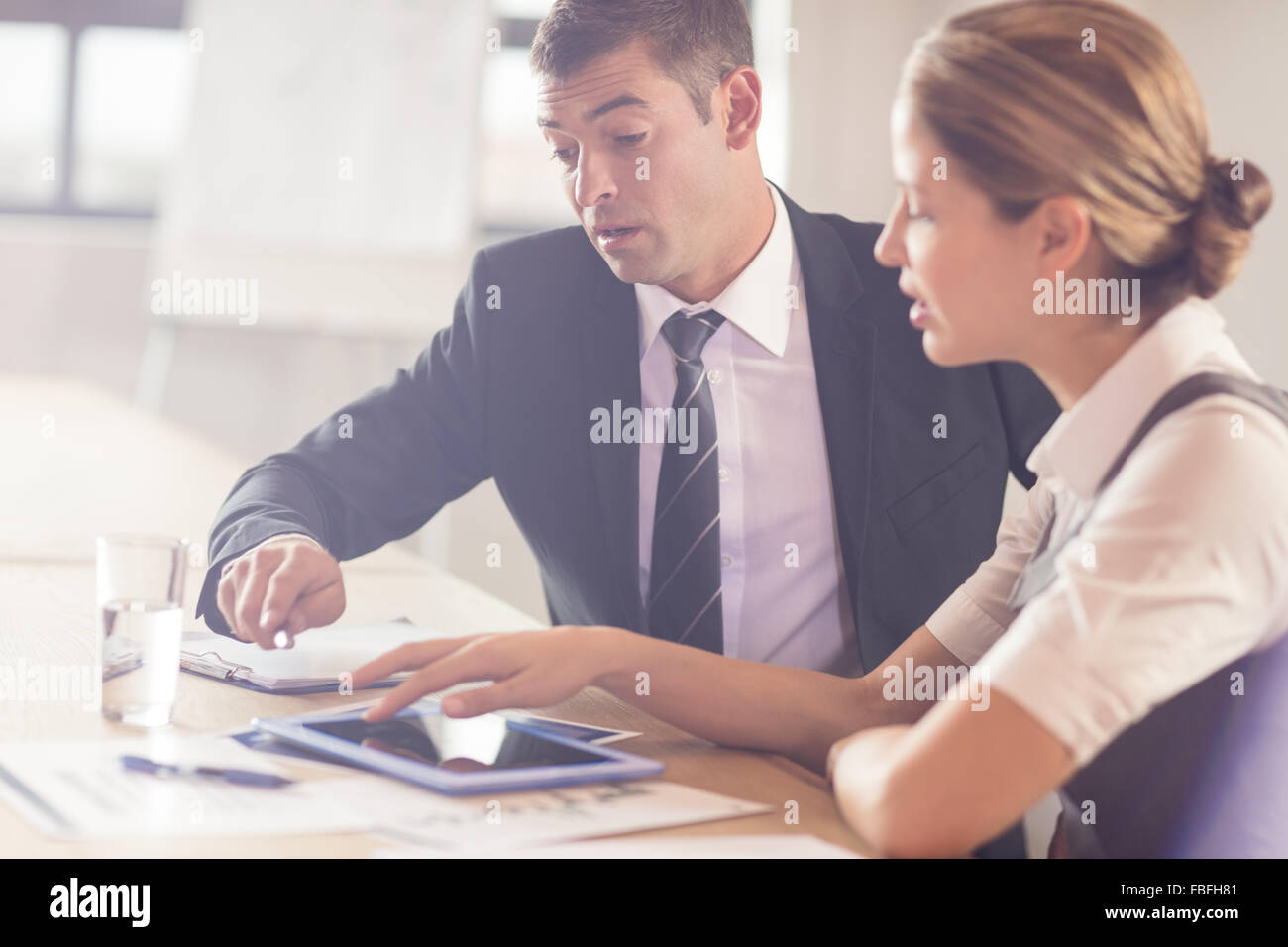 Business people using tablet Stock Photo - Alamy