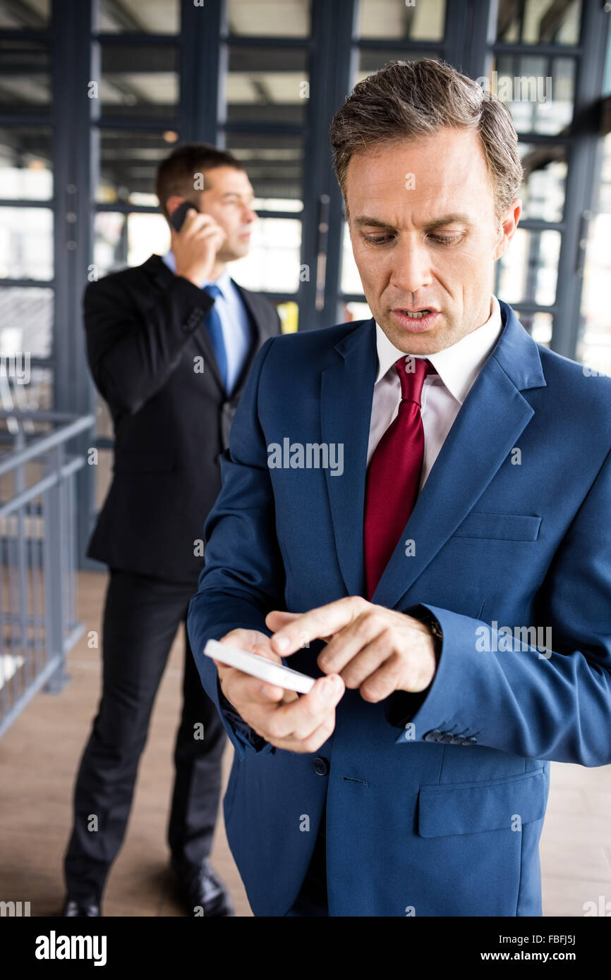 Business people having phone calls Stock Photo - Alamy