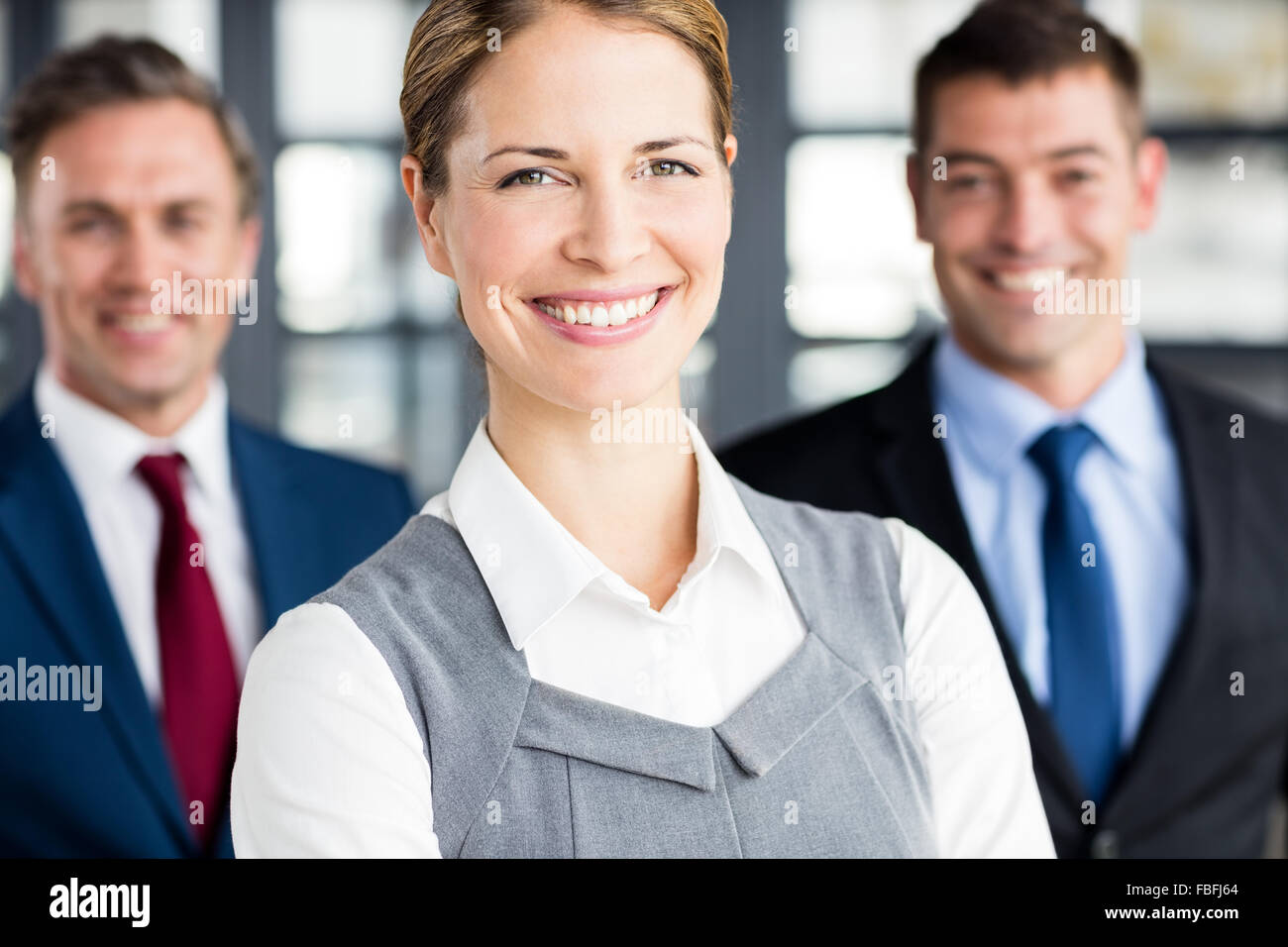 Portrait of smiling business people Stock Photo - Alamy