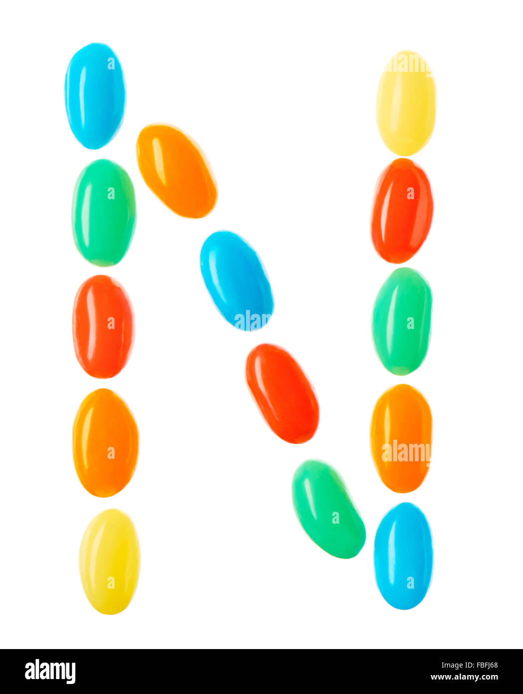 N letter made of multicolored candies isolated on white background ...