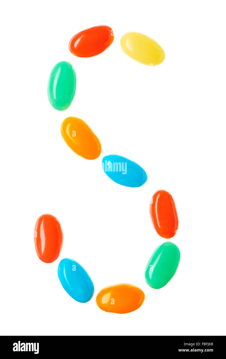 S letter made of multicolored candies isolated on white background ...