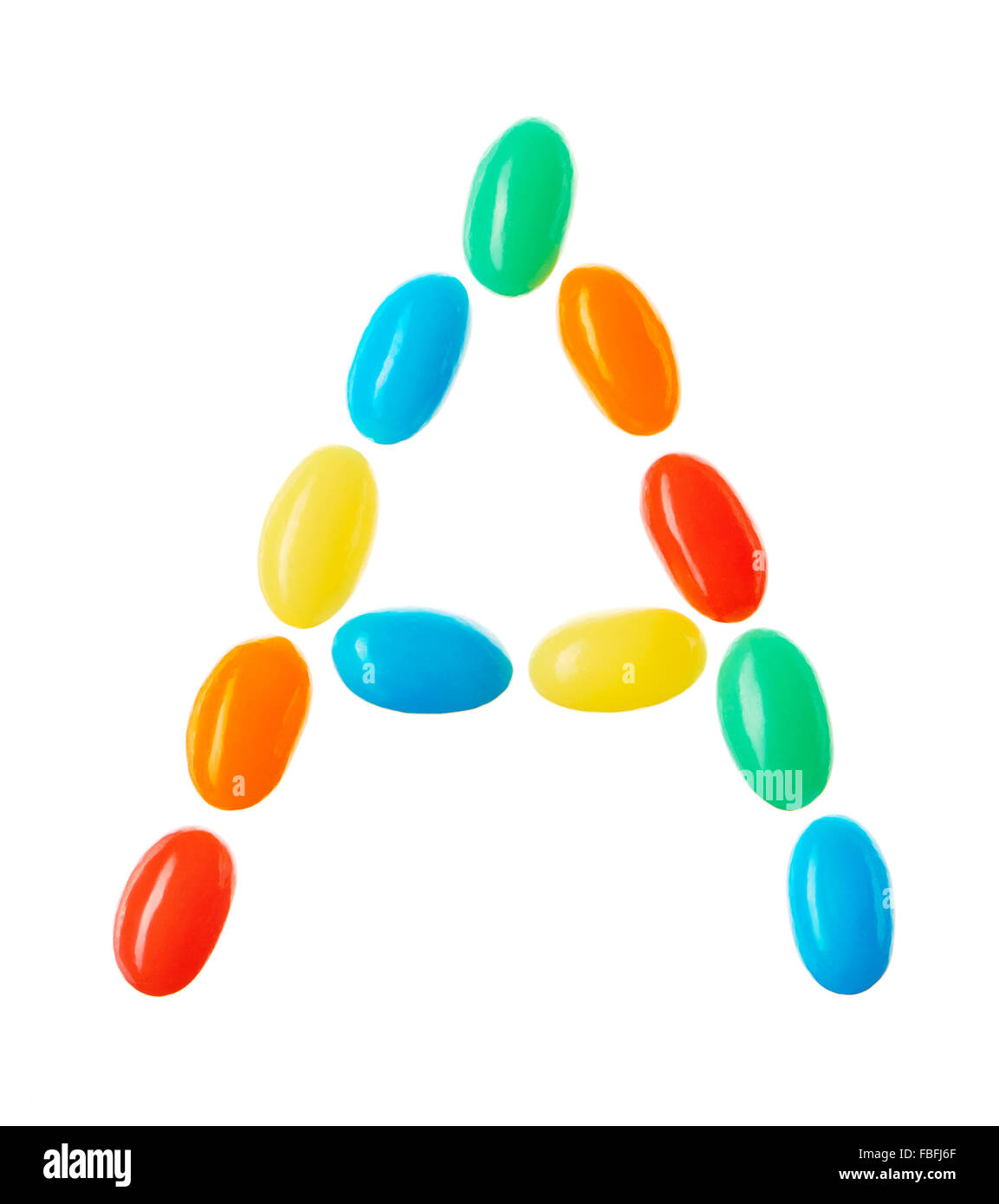 A letter made of multicolored candies isolated on white background ...