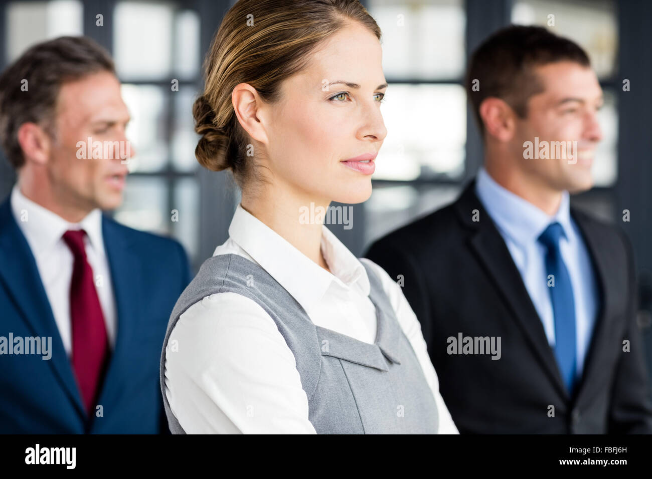 Portrait of thoughtful business people Stock Photo - Alamy