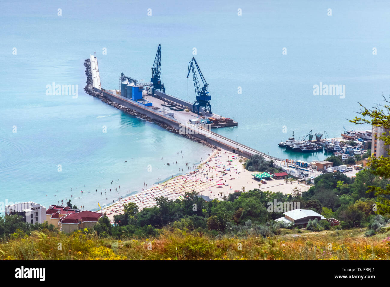 Beach near cargo port terminal of Balchik town. Black Sea coast ...