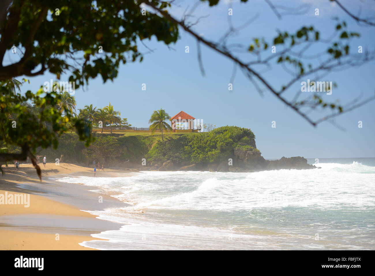 Tourists enjoying a sunny day at Dome's Beach. Rincon, Puerto Rico. USA ...