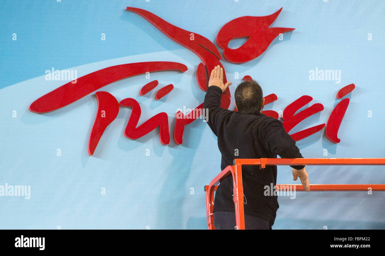 A worker assembles a stand with the Turkey a logo during the ...