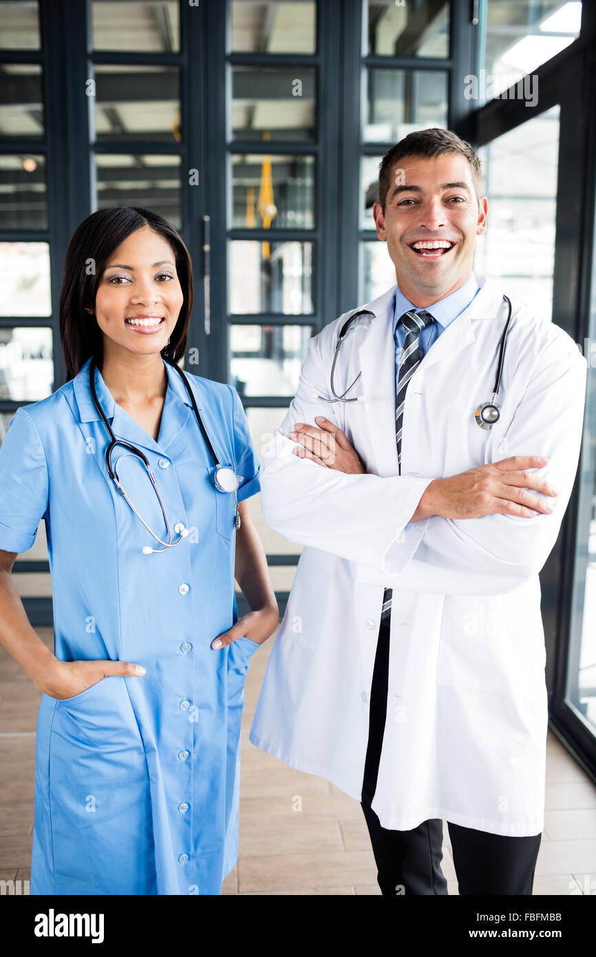 Nurse and doctor smiling Stock Photo - Alamy