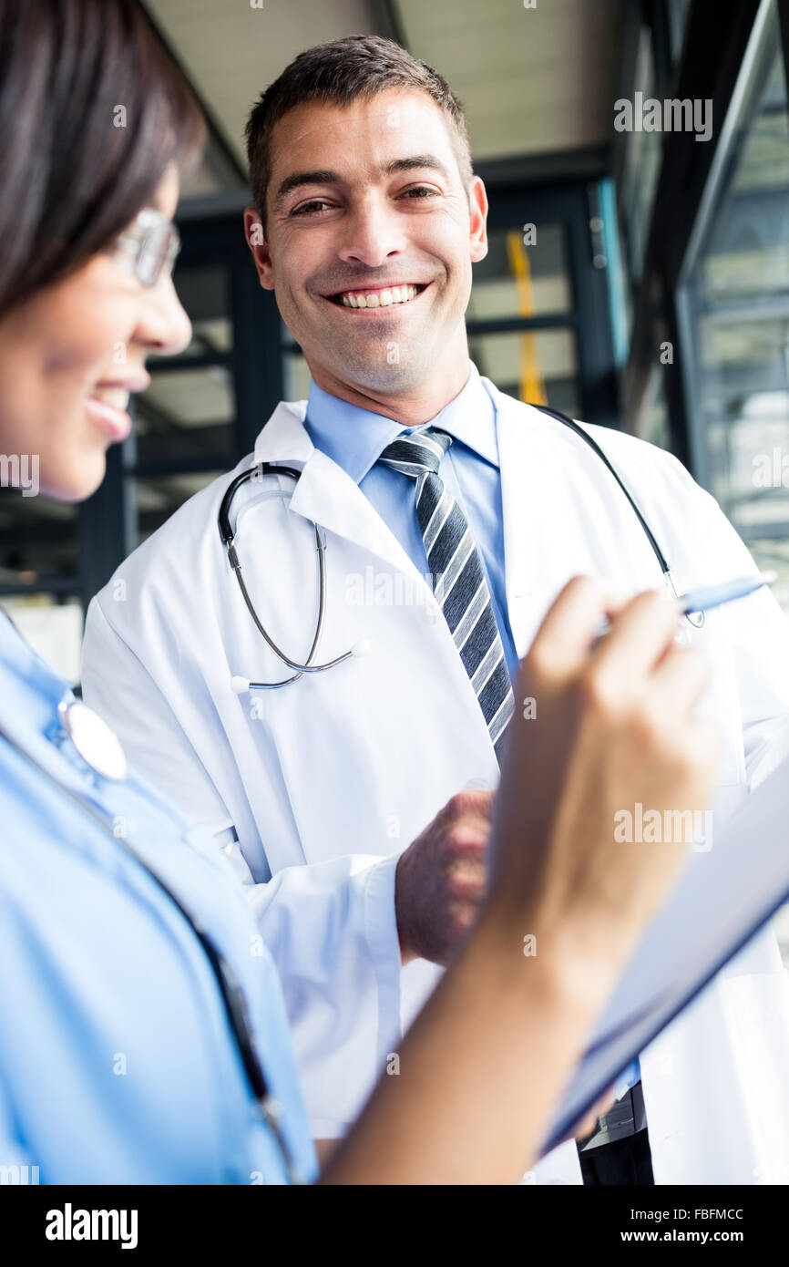 Happy woman looking at files hi-res stock photography and images - Alamy