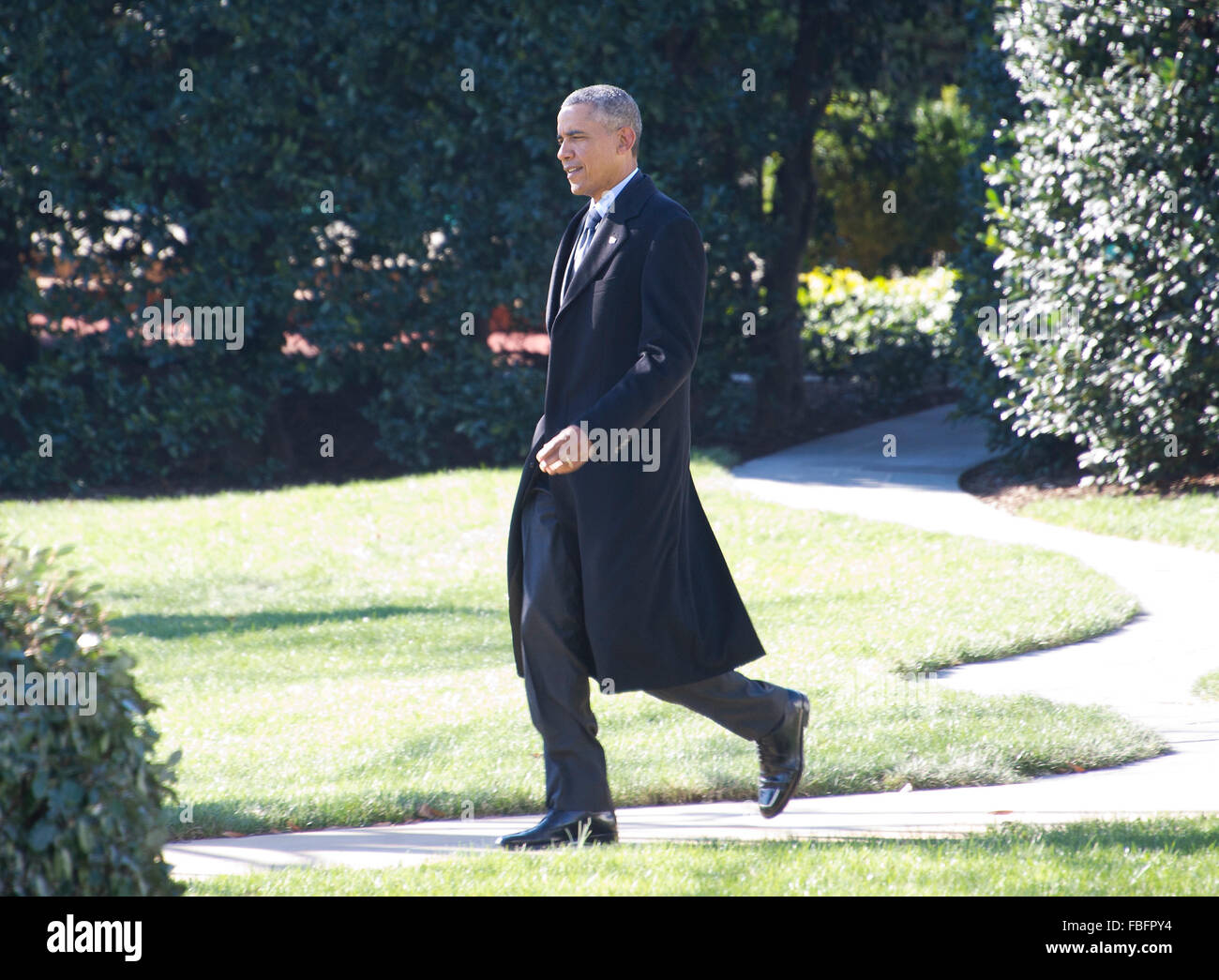 United States President Barack Obama walks across the South Lawn of the ...
