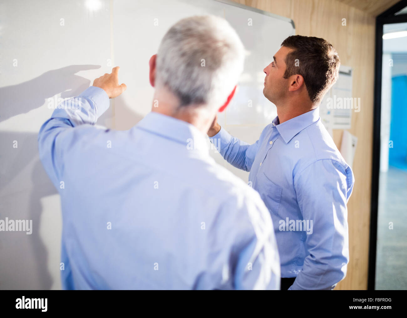 Well dressed man pointing something hi-res stock photography and images ...