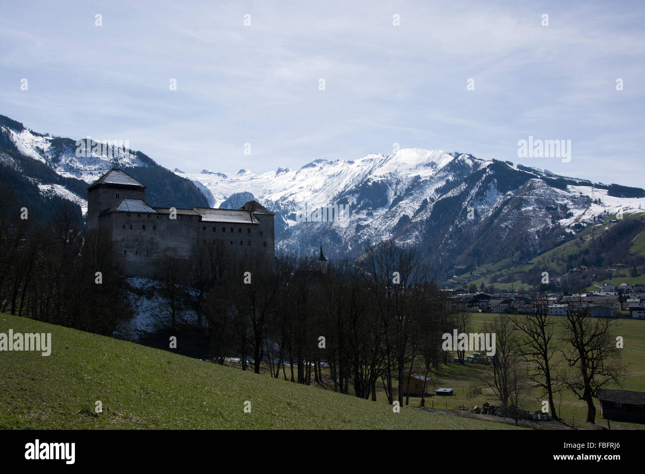 Kaprun Castle, a medieval fortress located in front of the mountain ...