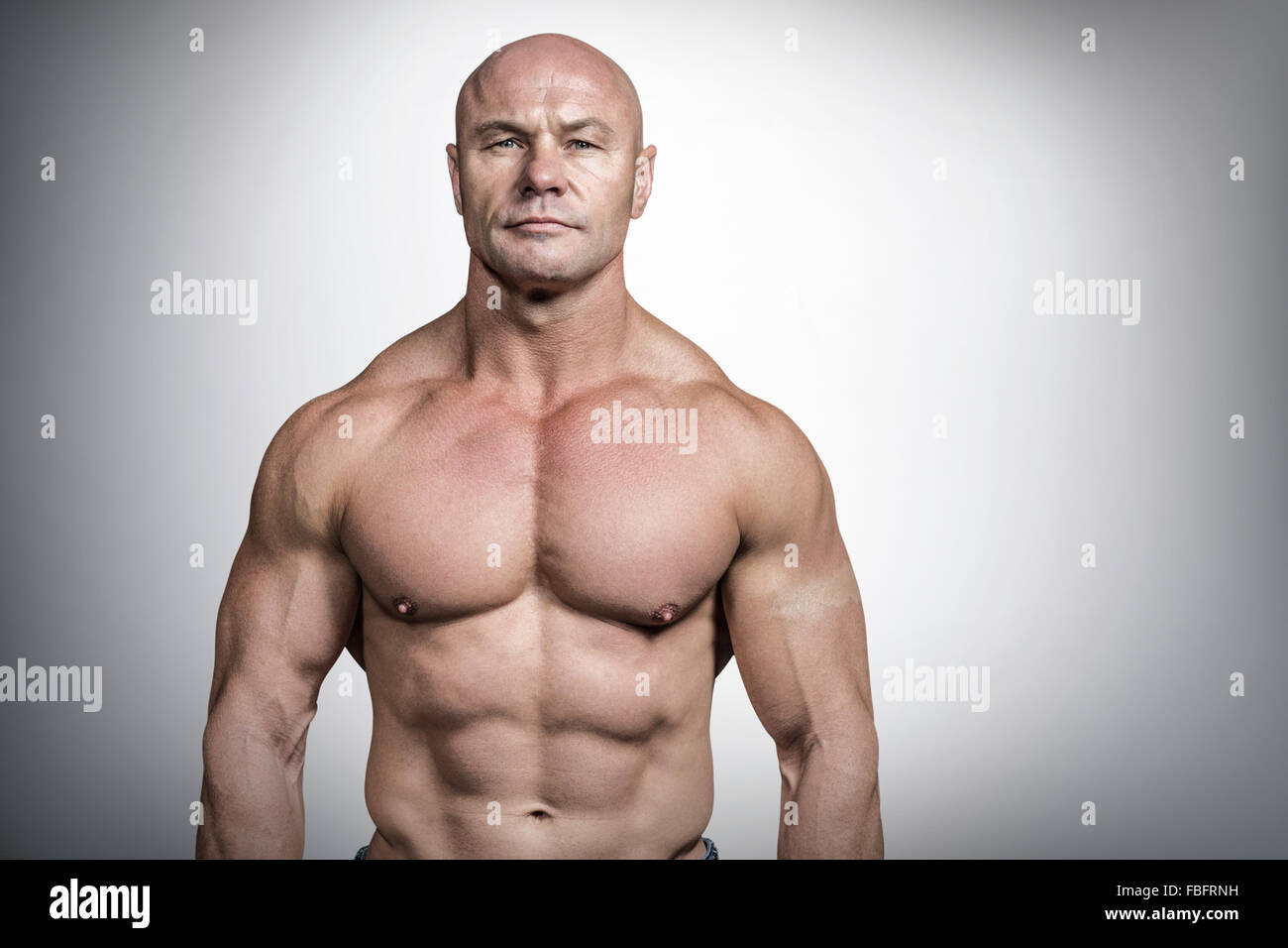 Composite image of portrait of confident bodybuilder man Stock Photo ...