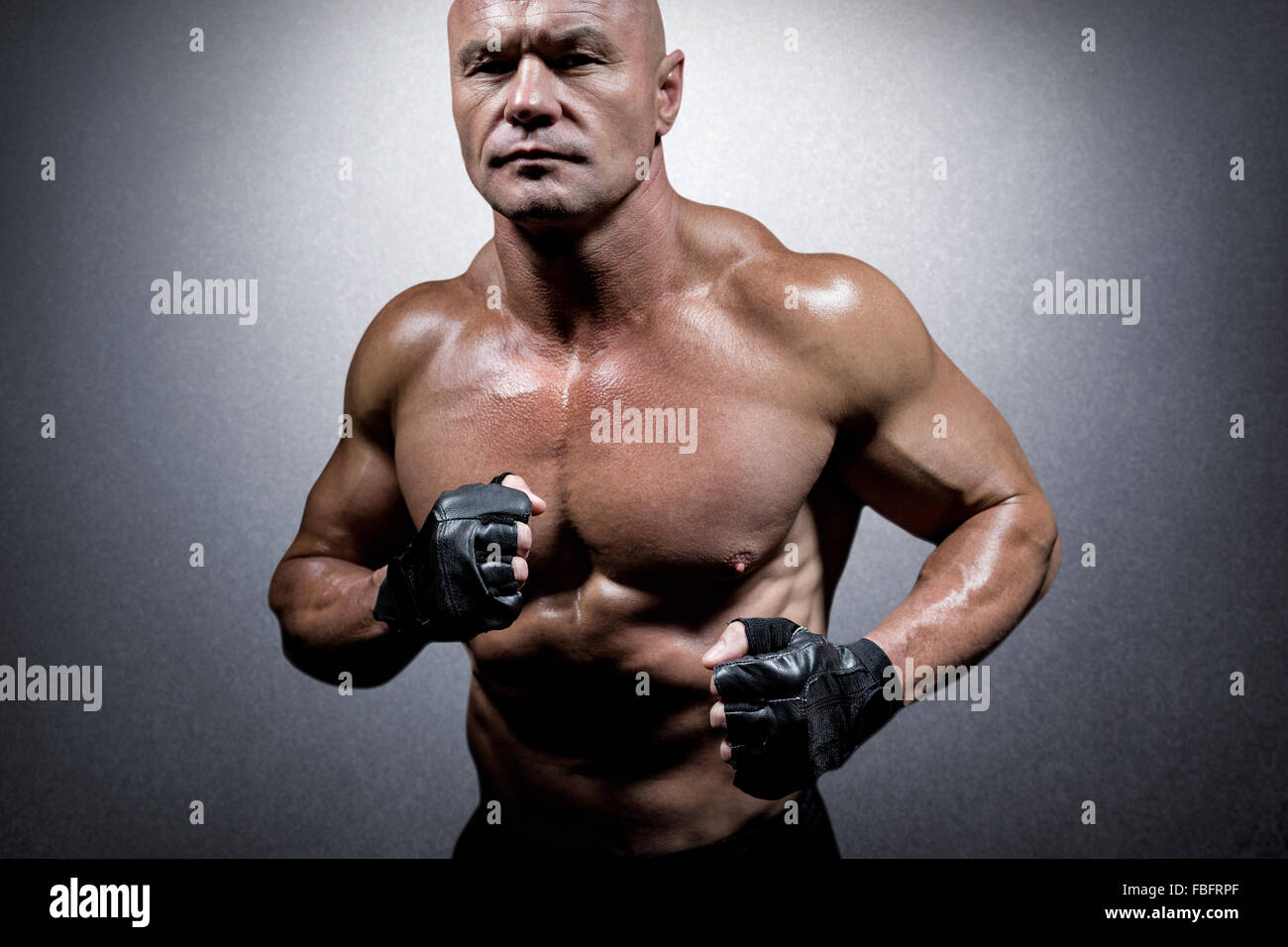 Composite image of portrait of confident man with fighter stance Stock ...