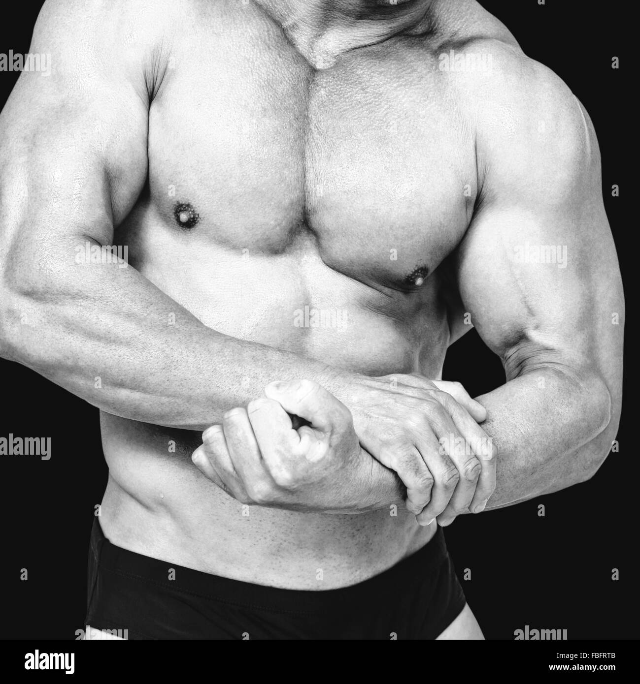 Composite image of midsection of shirtless man flexing muscles Stock ...