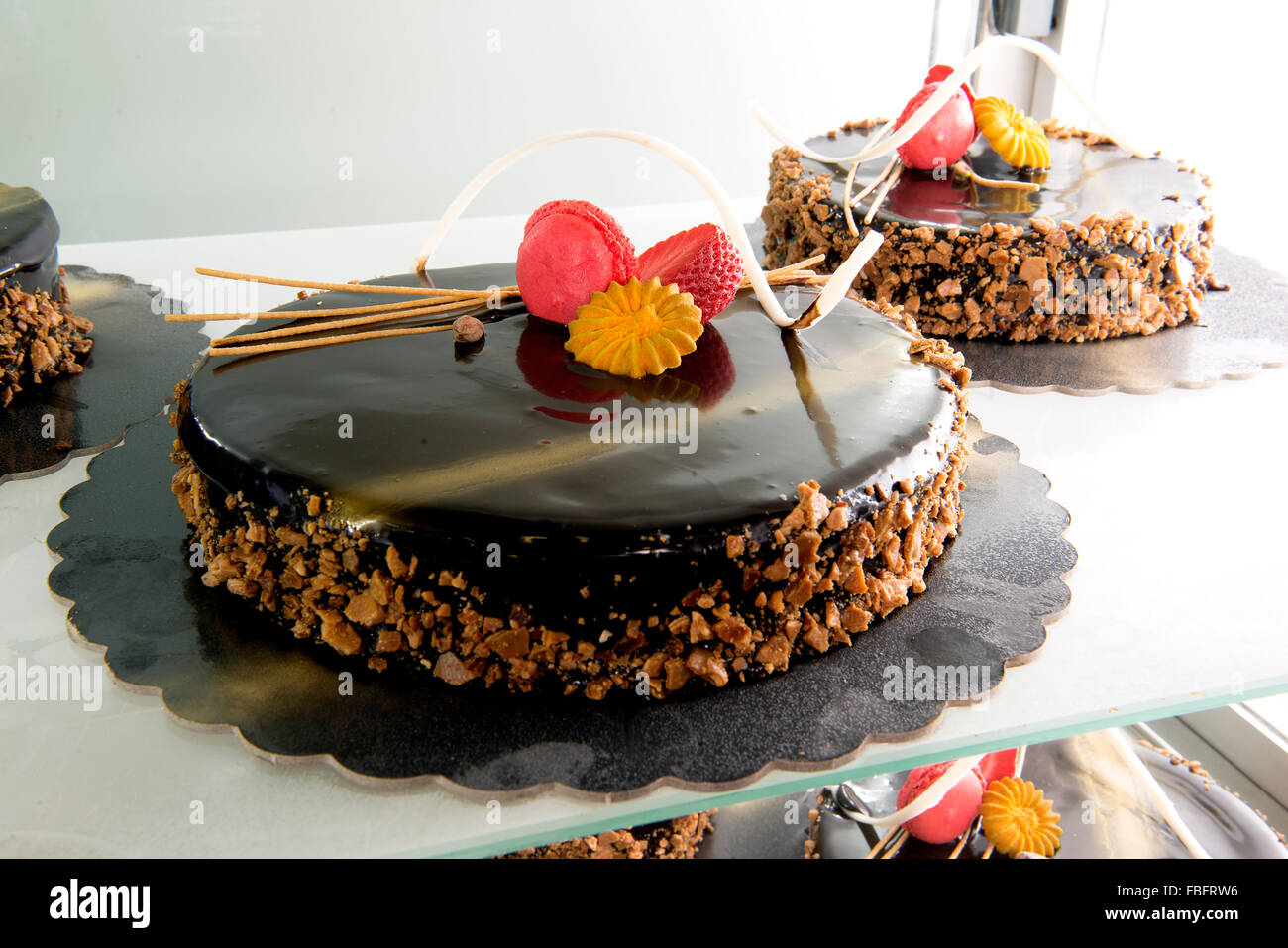 cakes in a refrigerator display Stock Photo - Alamy