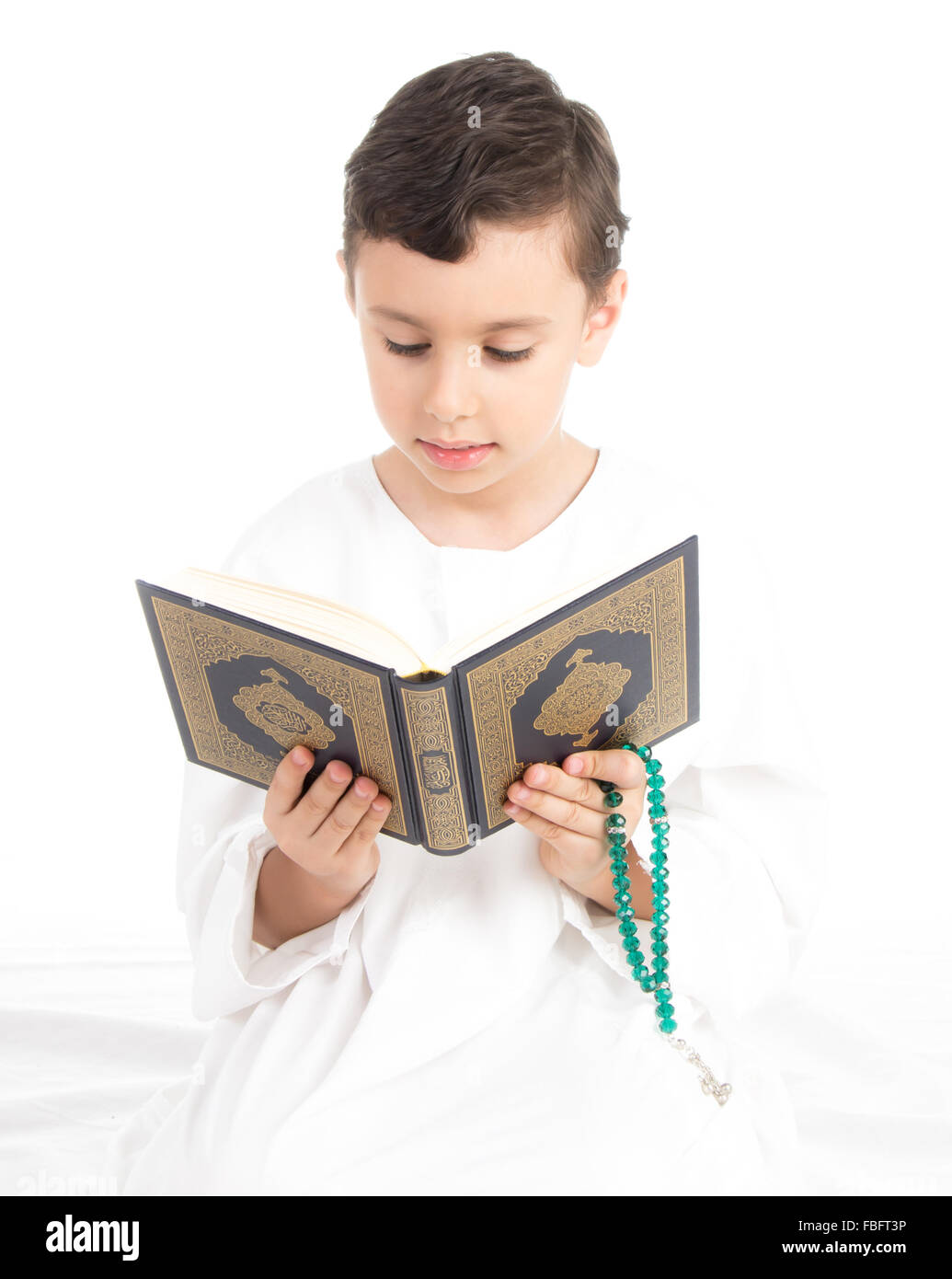 Boy reading the quran hi-res stock photography and images - Alamy