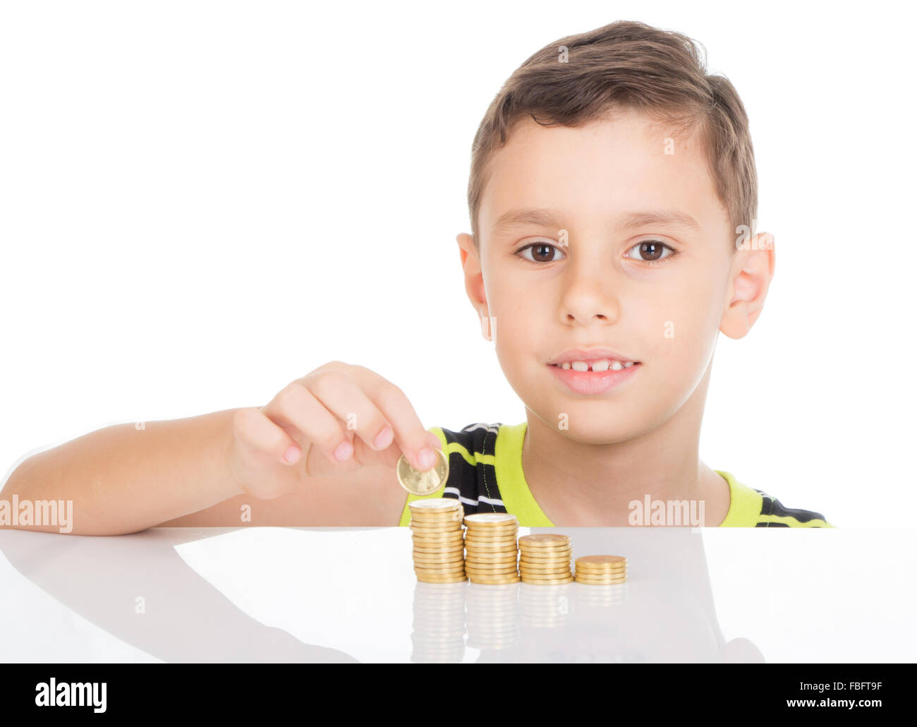 Child counting coins hi-res stock photography and images - Alamy
