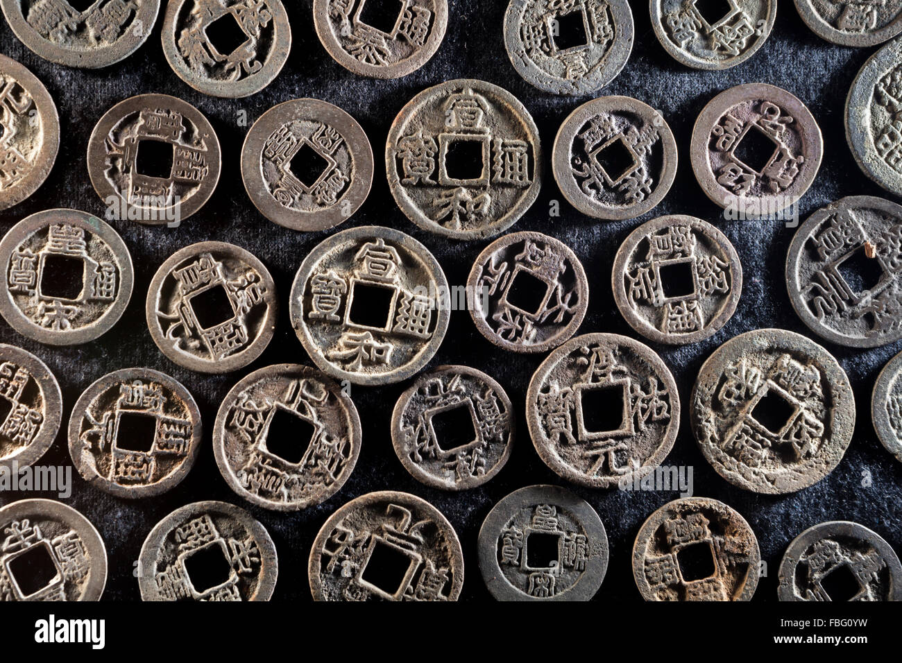 Chinese currency coins hi-res stock photography and images - Alamy