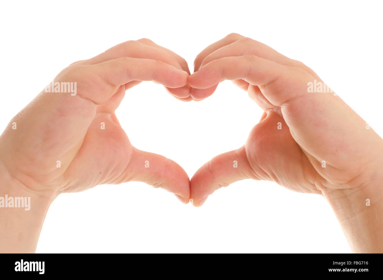Children's hands show signs of heart Stock Photo - Alamy