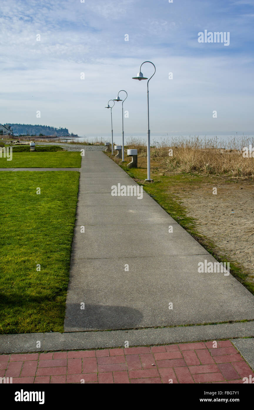 Paved walkway along the beach at the Semiahmoo Resort in Blaine ...
