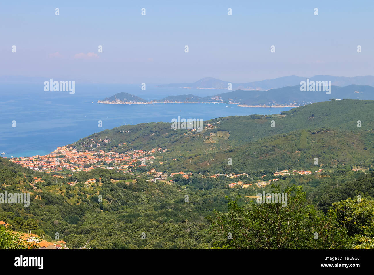 Coast of Tyrrhenian Sea on Elba Island, Italy. Panorama of Marciana ...