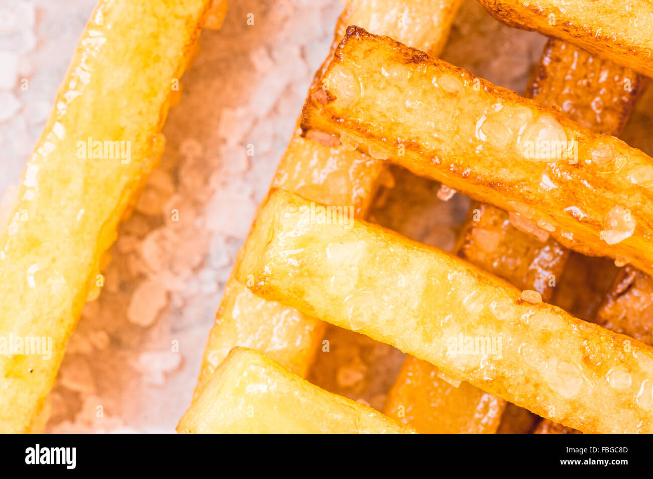 French fries close up with oil and salt crystals Stock Photo - Alamy