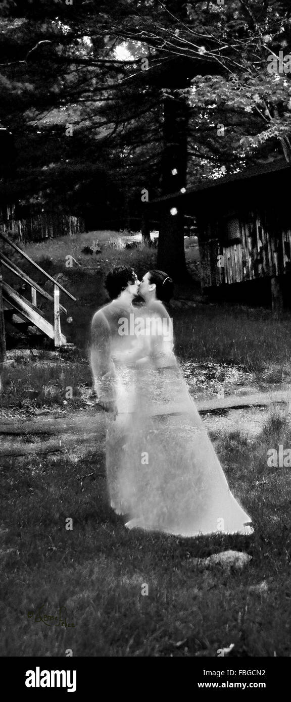 Man and woman ghosts kissing fading into outdoor nature, possibly bride ...