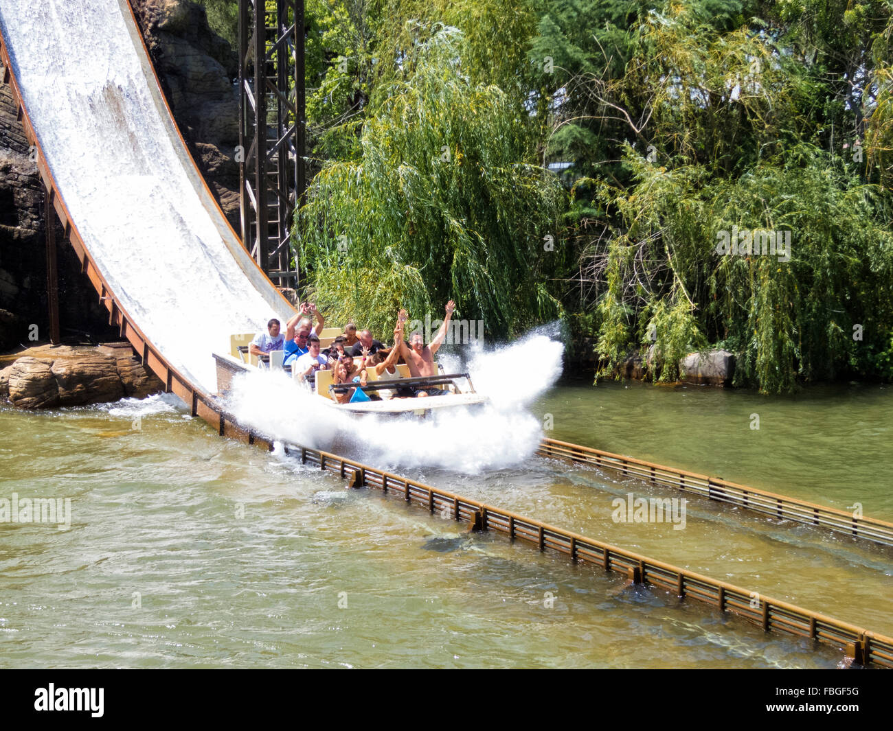 People enjoying in aquatic roller coaster Stock Photo - Alamy