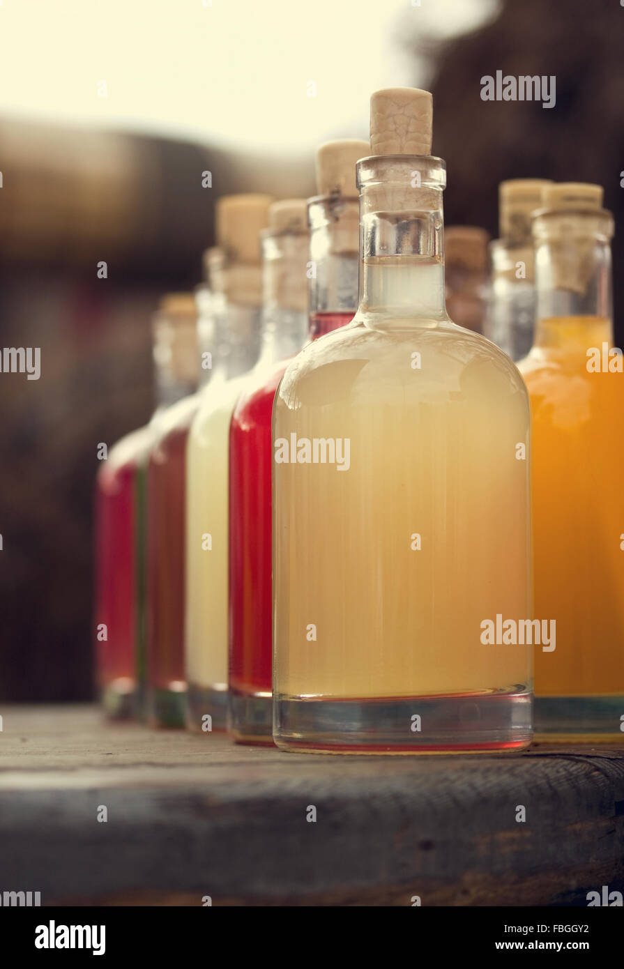 bottles with homemade alcohol Stock Photo - Alamy