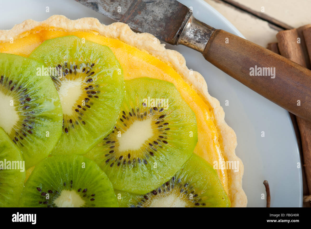 kiwi pie tart with lemon custard cream and spices Stock Photo - Alamy
