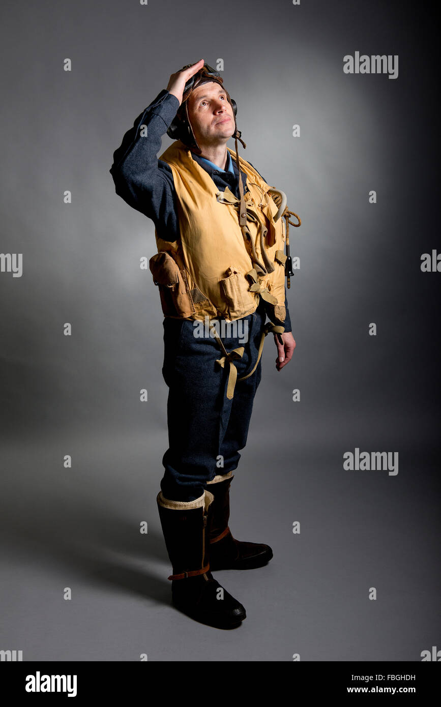 World War Two RAF pilot/ bomber crew member, looking towards the skies ...