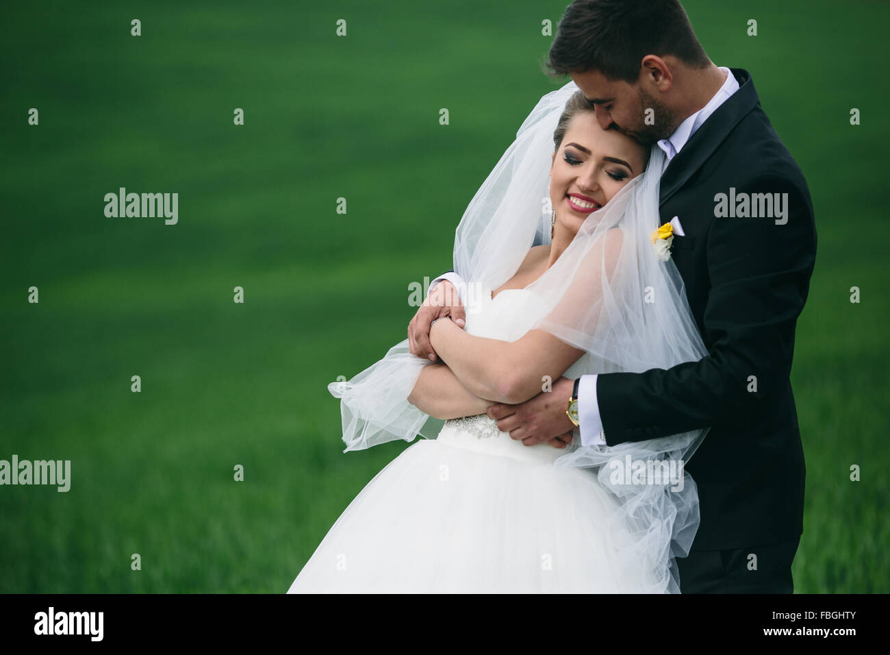 Beautiful wedding couple on nature Stock Photo - Alamy