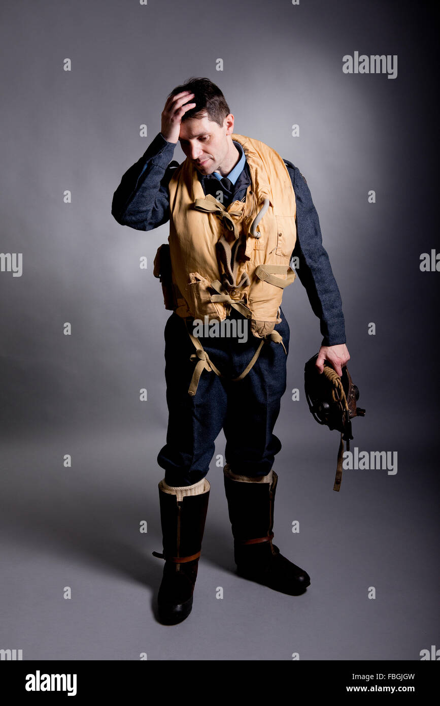 Shell shocked WW2 Royal Air Force pilot/aircrew member, looking down ...