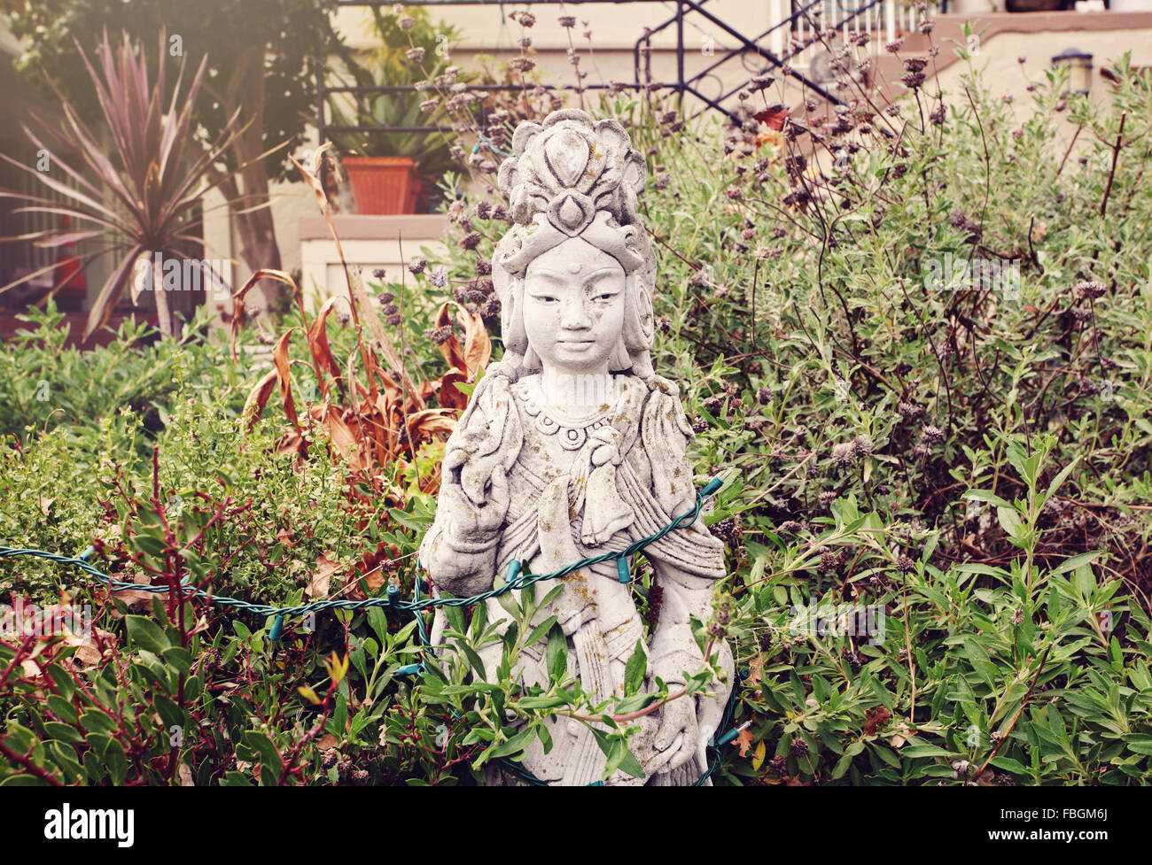 Goddess statue standing in garden in blessing position Stock Photo - Alamy
